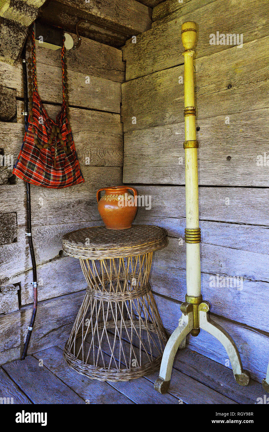 romanian traditional rural setup of a porch, detail on old wooden house ...