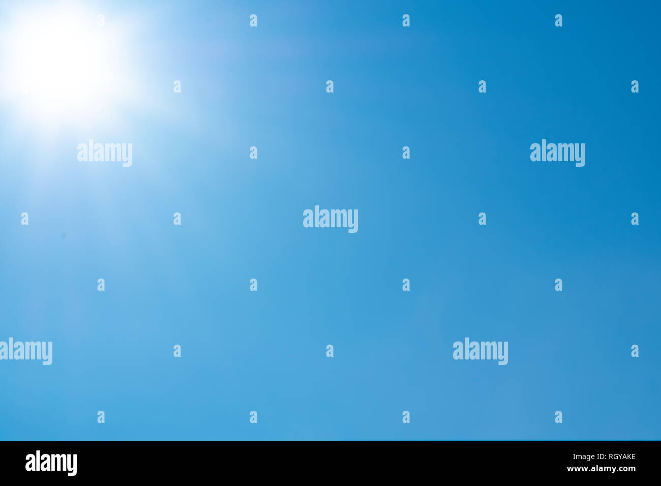 Clear sky with sun and sunrays. Daytime and good weather Stock Photo ...