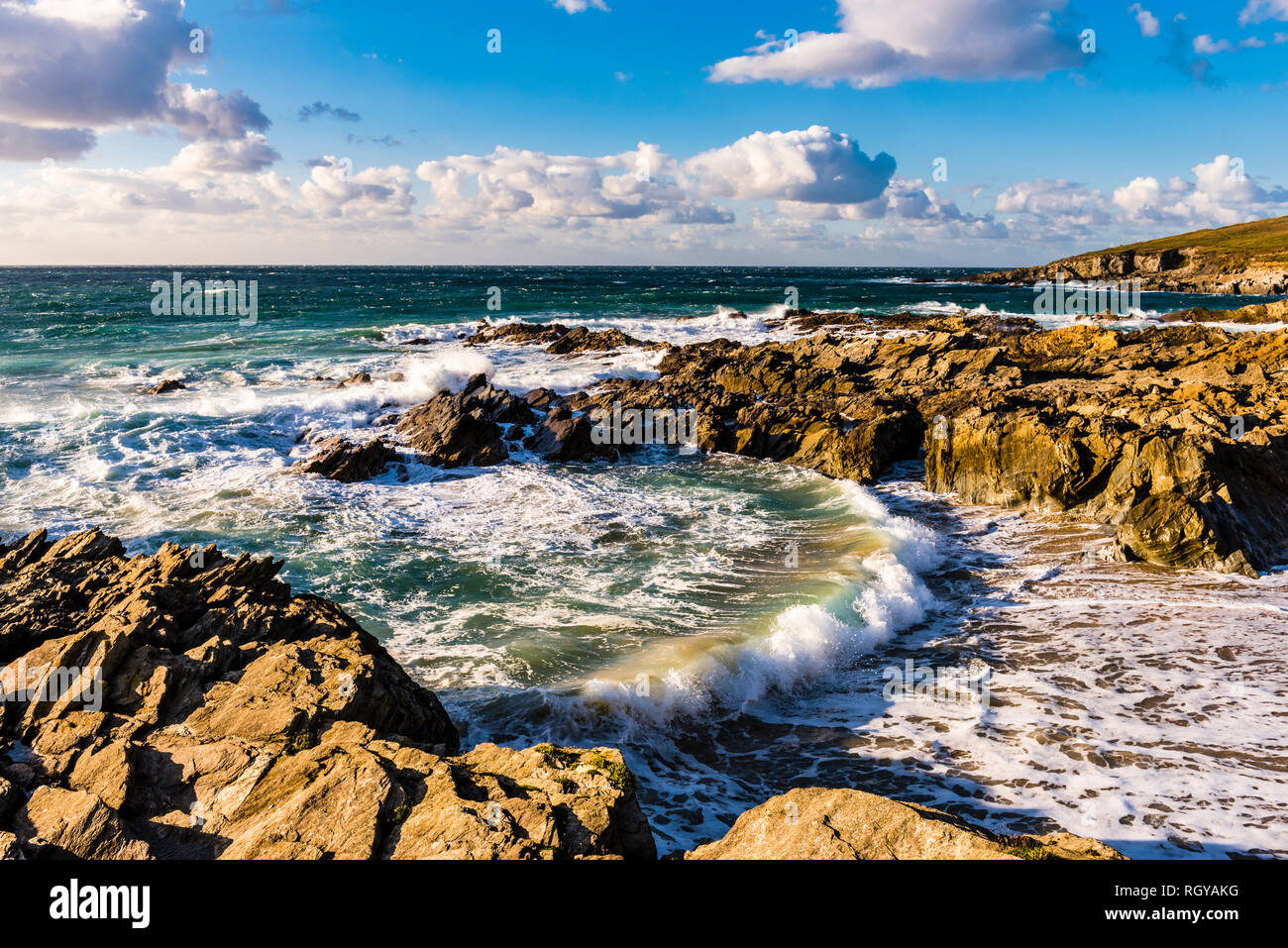 Breaking waves and surf in a cove at Fistral Beach, Newquay, Cornwall ...
