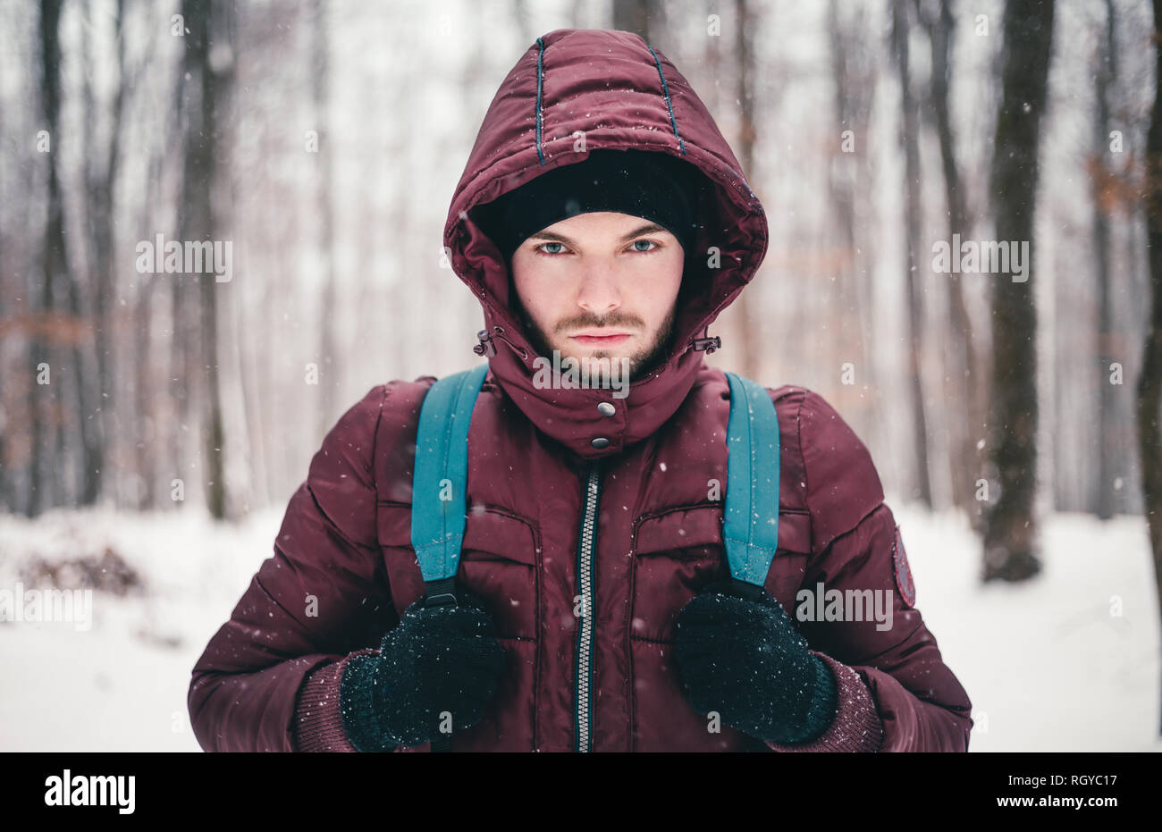 Male model posing in snow hi-res stock photography and images - Alamy