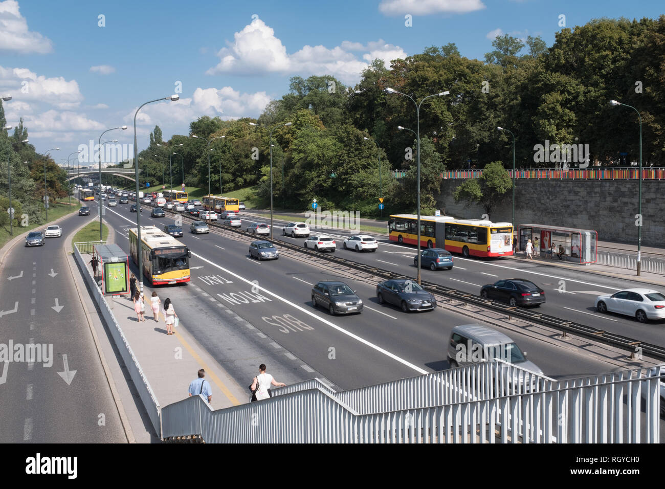 motorway traffic in the summer with bus stops Stock Photo - Alamy