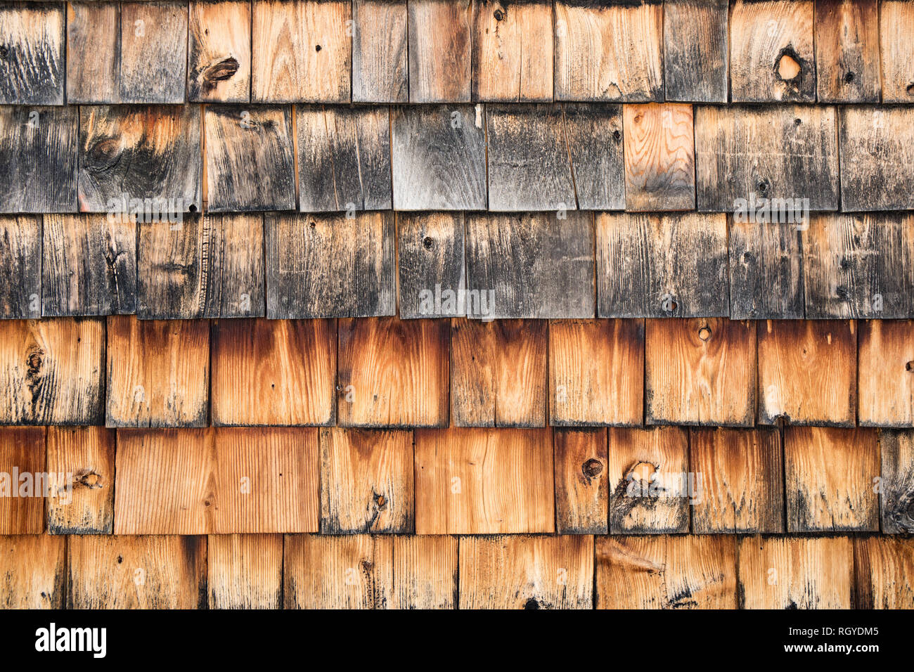 A shingled wall for a texture and patterned background Stock Photo - Alamy