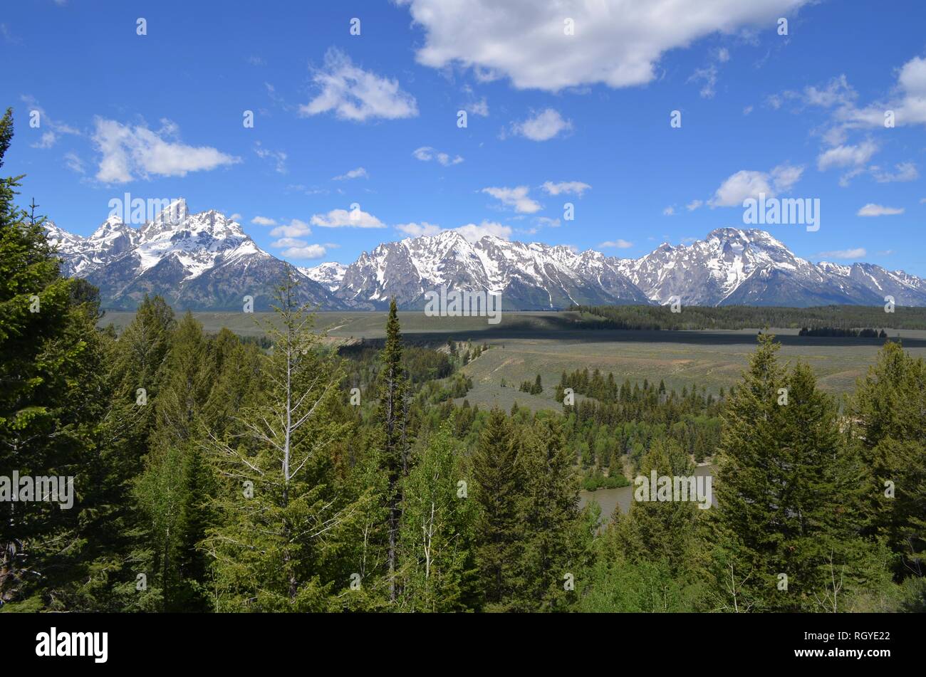 Grand Tetons mountains' jagged peaks with June snow Stock Photo - Alamy
