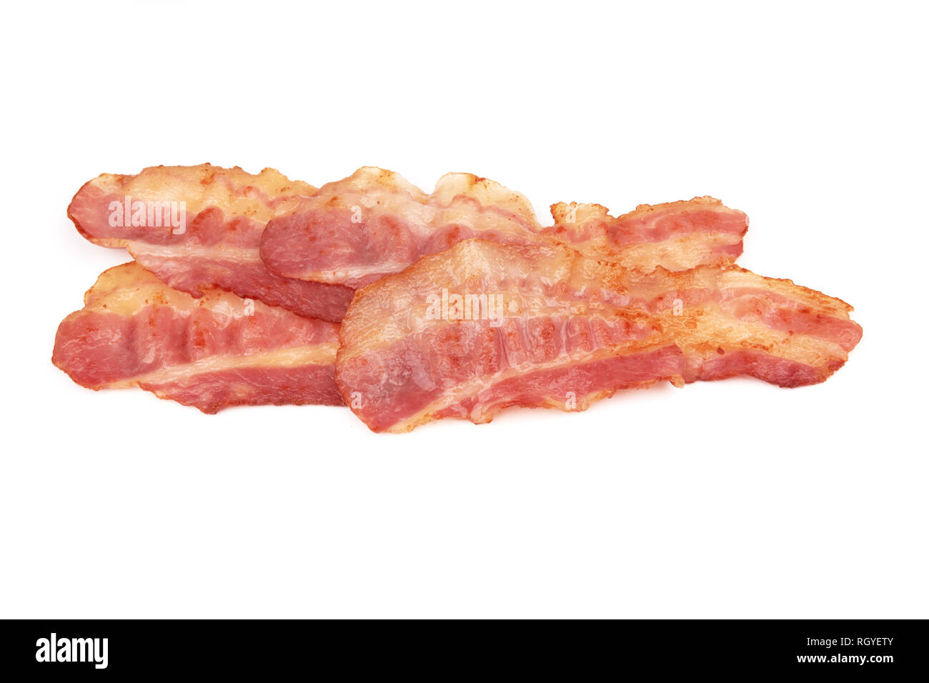 Cooked bacon rashers isolated on white background Stock Photo - Alamy