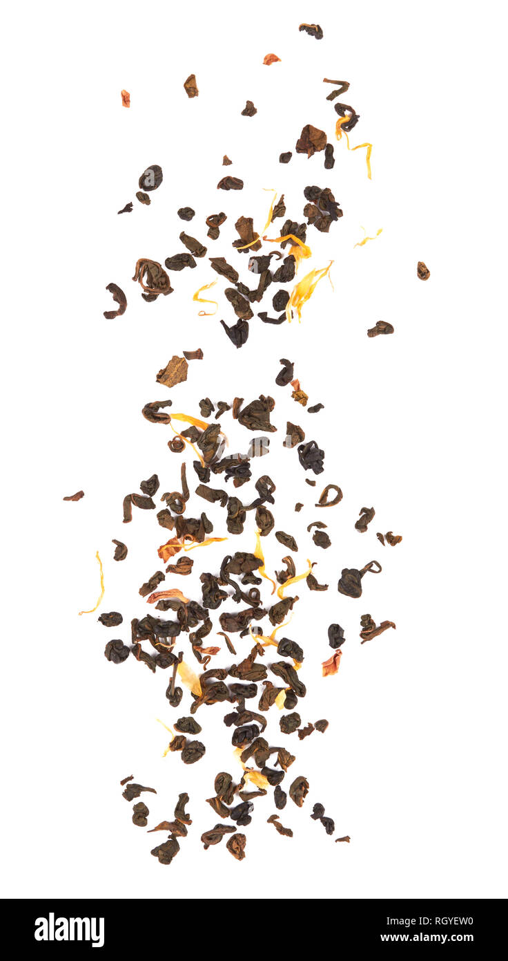 Falling dried tea leaves isolated on white background Stock Photo - Alamy