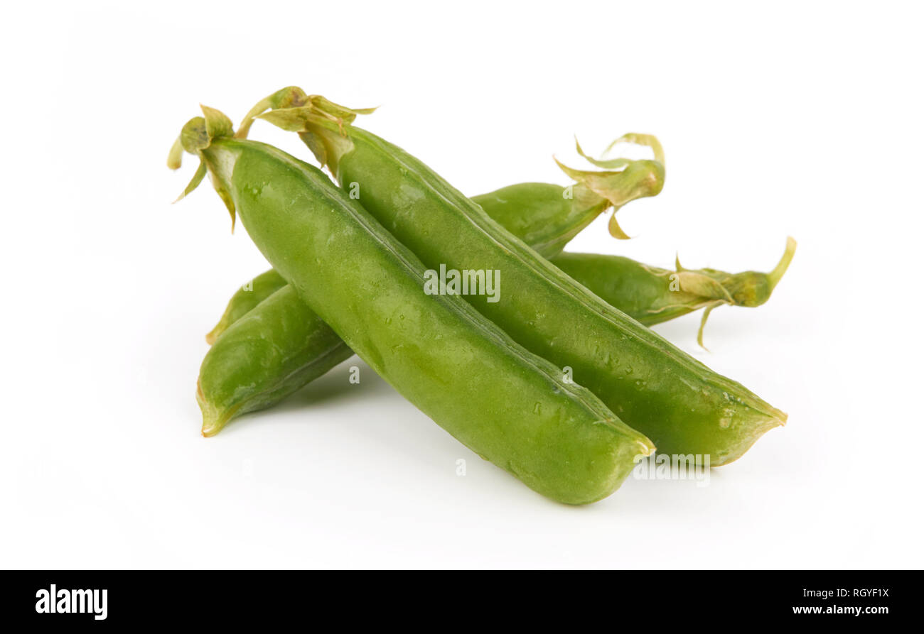 Fresh green pea pod on white background Stock Photo - Alamy