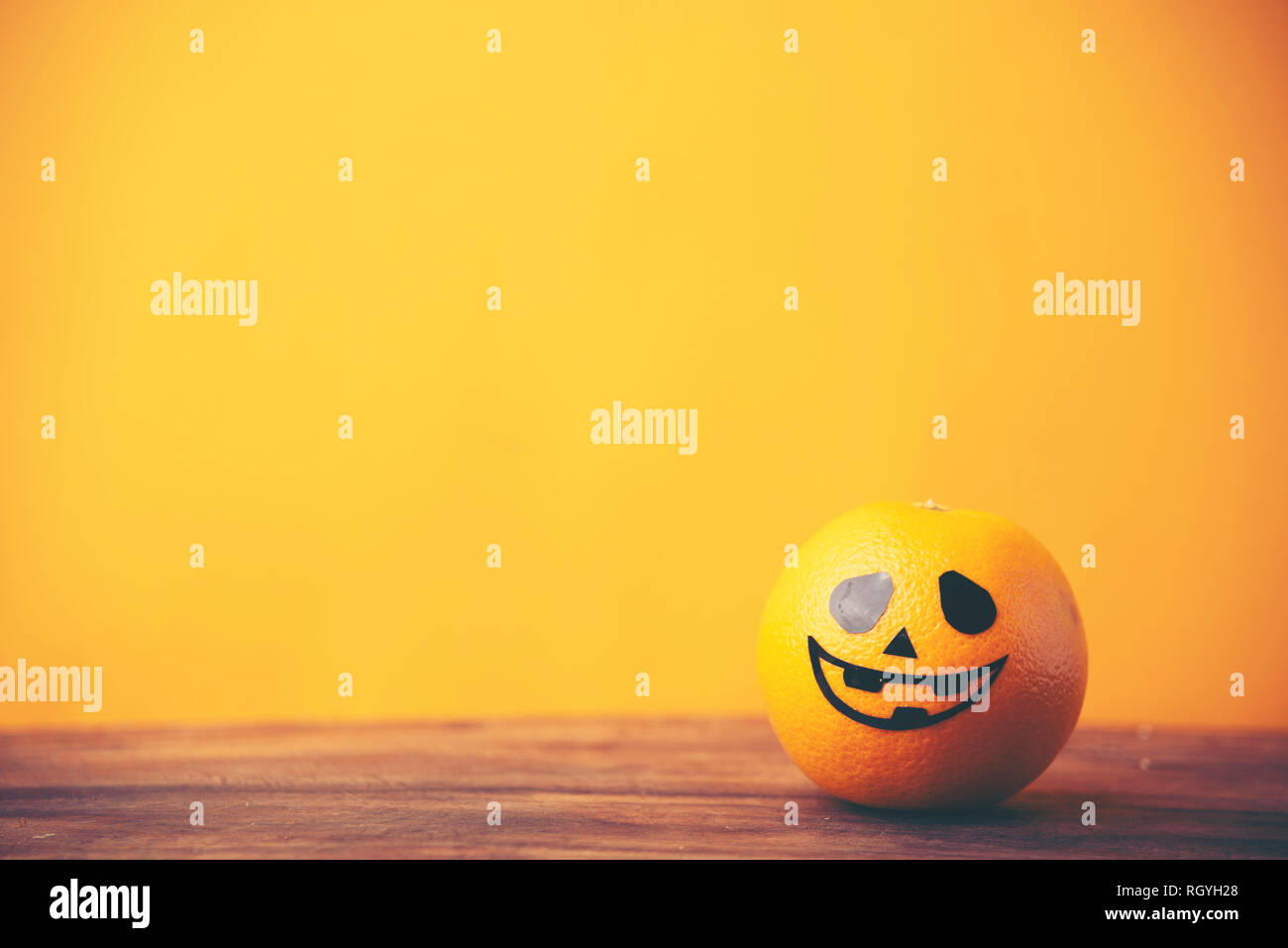 Halloween concept in yellow background Stock Photo - Alamy