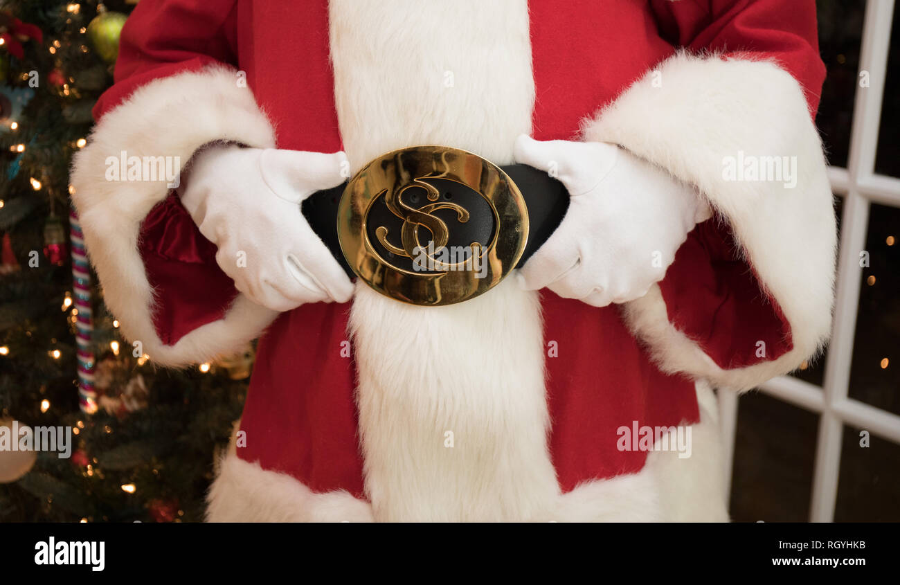 A close up photo of Santa Claus's belly with him holding his belt Stock ...