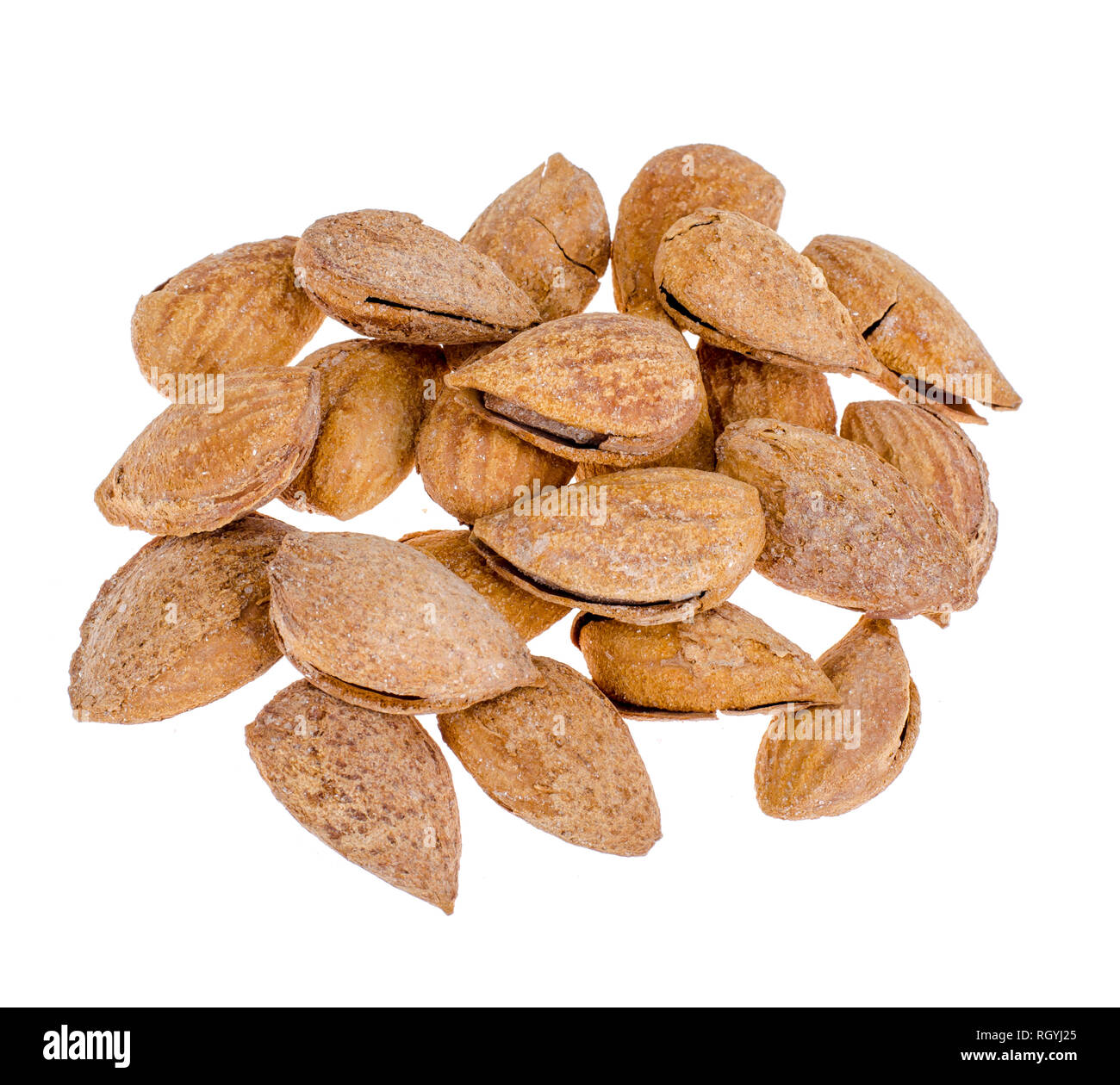 Heap of fresh unpeeled almonds isolated on white background. Studio ...
