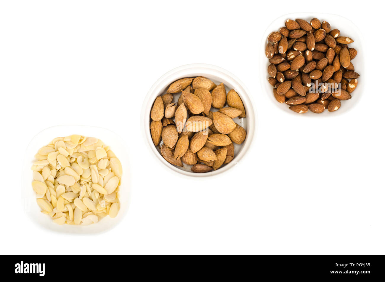 Whole, peeled and sliced almonds, top view. Studio Photo Stock Photo ...