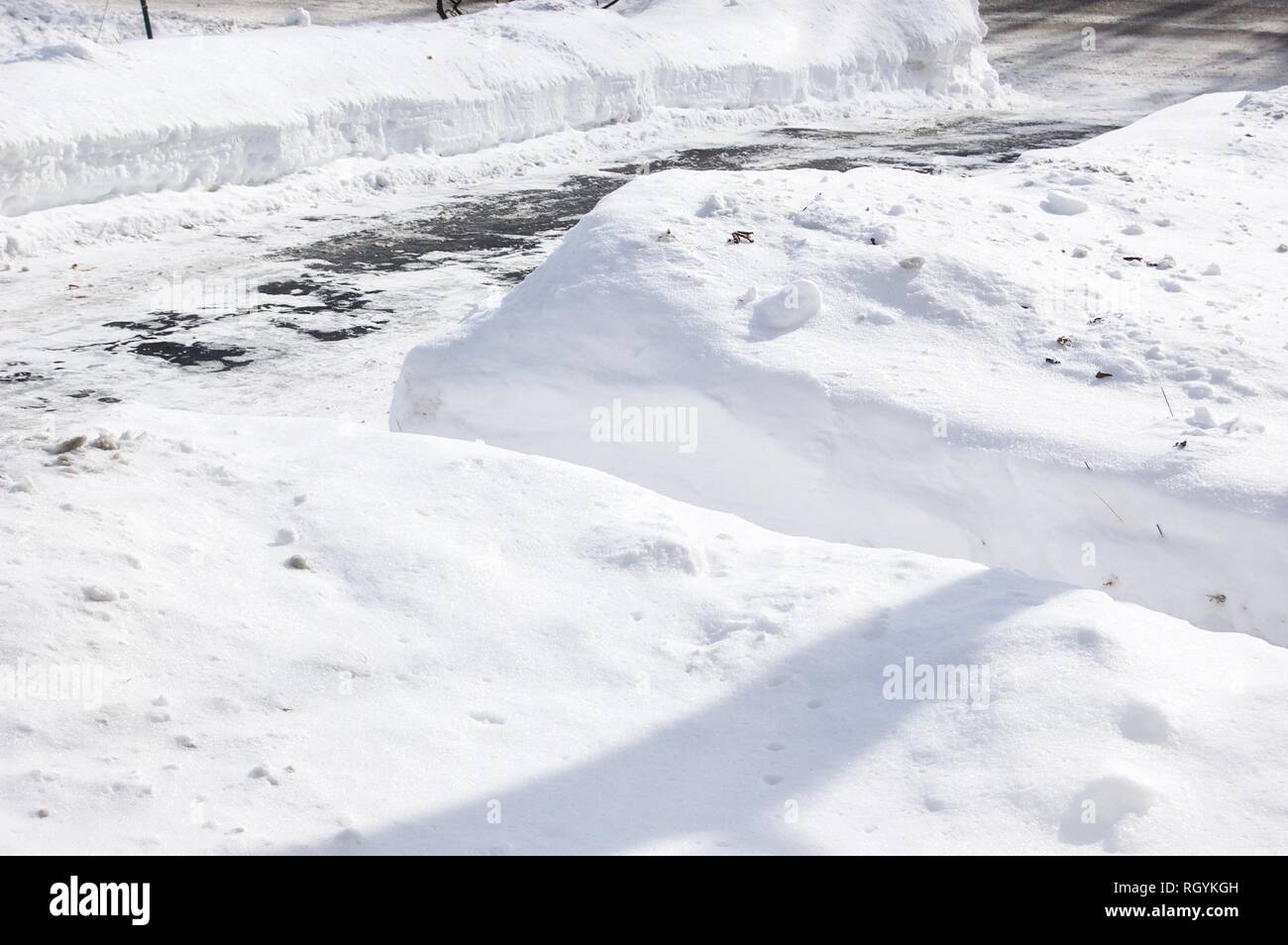 Snow Covered Yard with Shoveled Path and Driveway after a Snowstorm ...