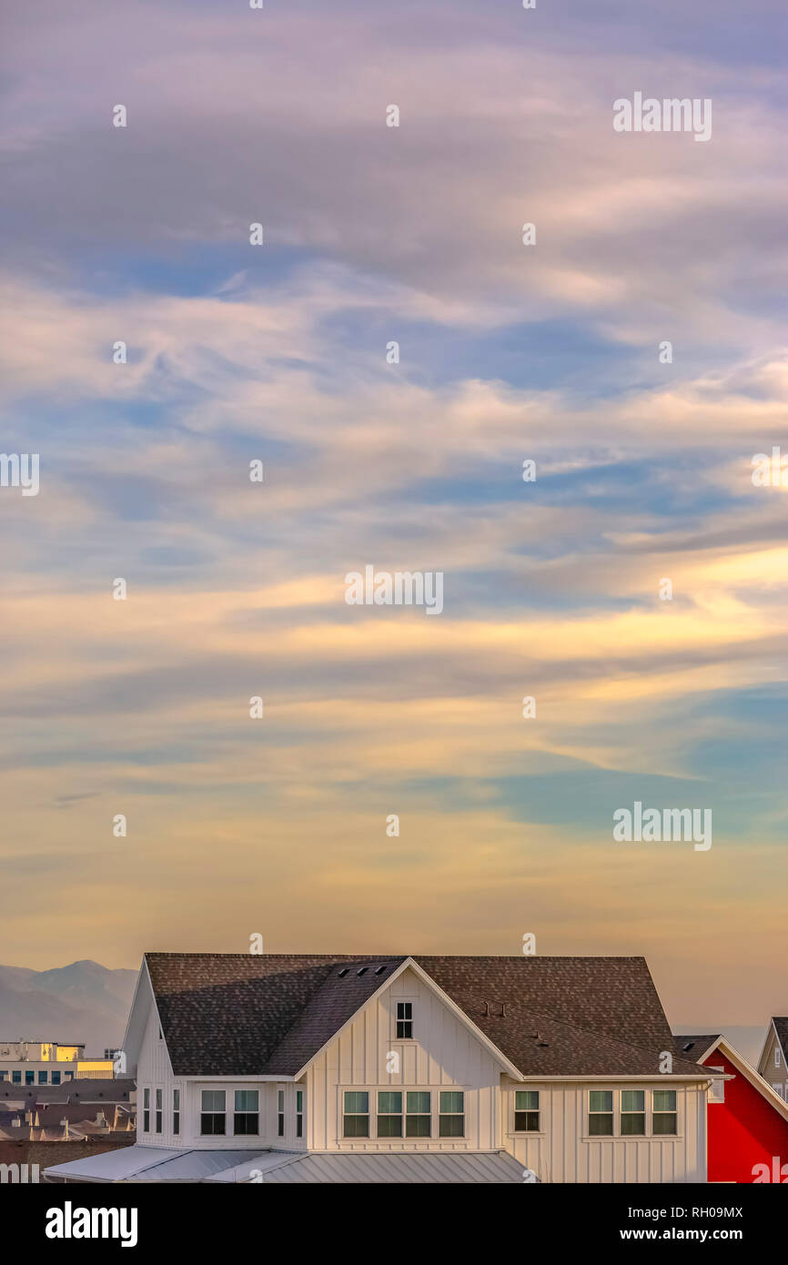 Blue sky with clouds over homes in Daybreak Utah Stock Photo - Alamy