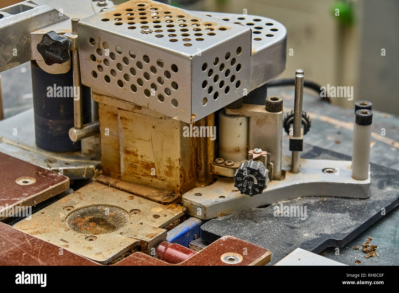 Edge banding machine in the workshop. Close-up. Wooden furniture ...