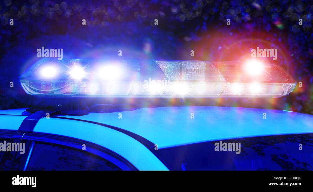 Police car with focus on siren lights at night time. Beautiful siren ...
