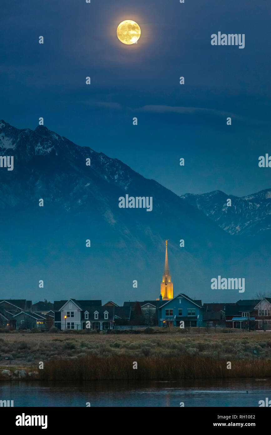 Daybreak community with mountain and sky at night Stock Photo - Alamy