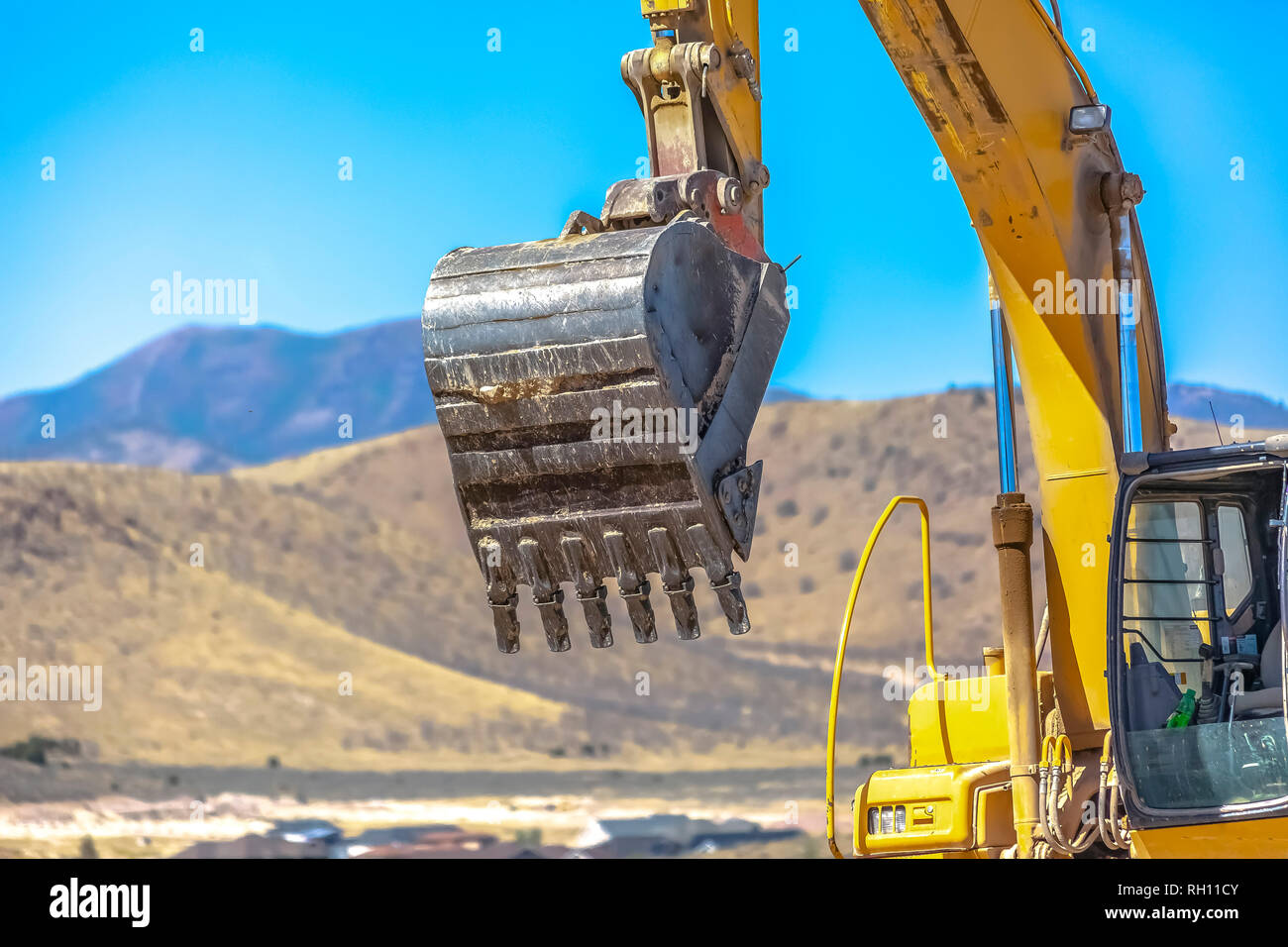 Mechanical diggers excavating earth on hi-res stock photography and ...