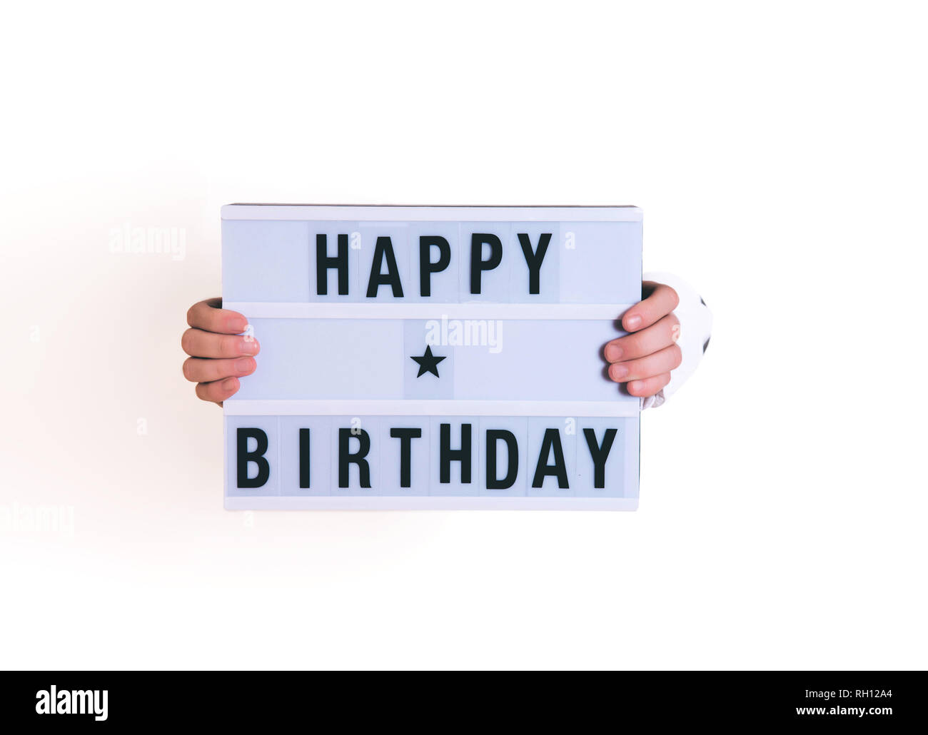 Hands holding Happy birthday sign Stock Photo - Alamy