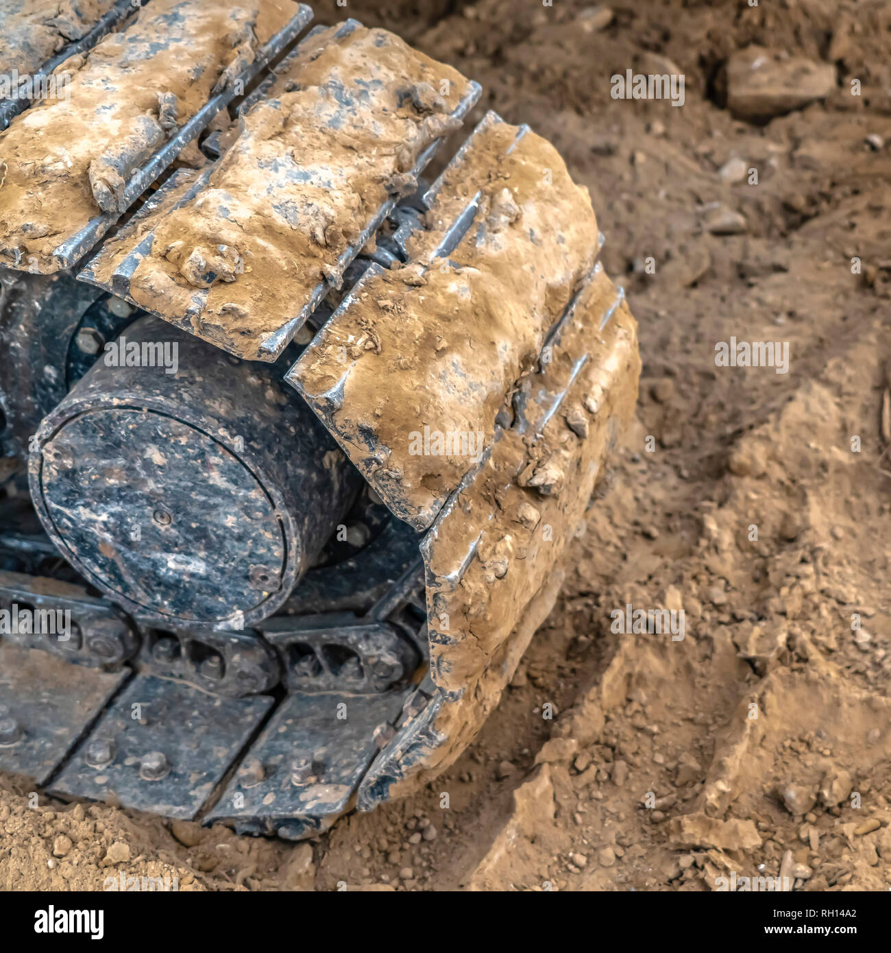 Excavator track pad and tread mark on dirt Stock Photo - Alamy