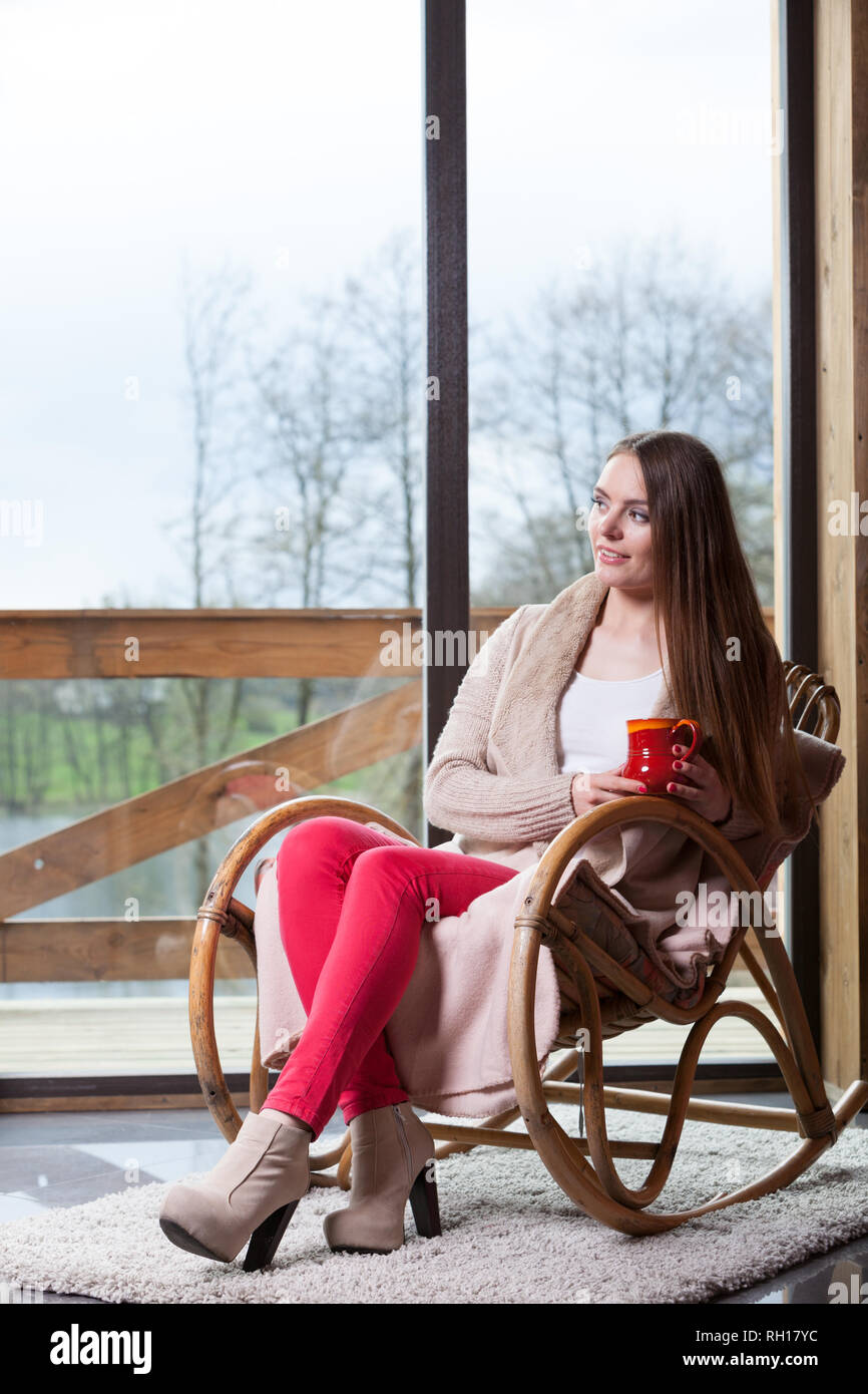 Rocking chair in front window hi-res stock photography and images - Alamy