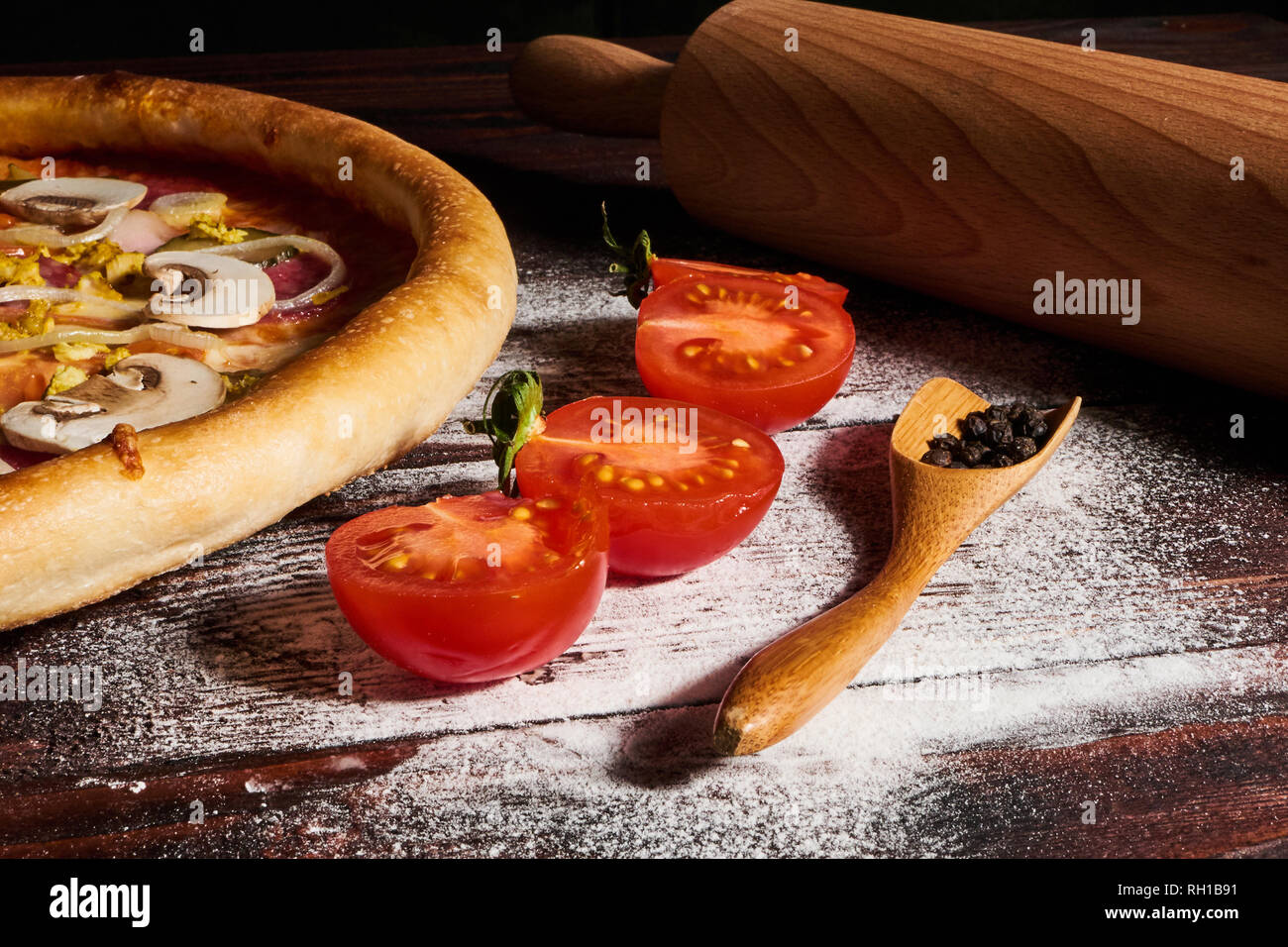 spoon with tomato paste and pizza Stock Photo - Alamy