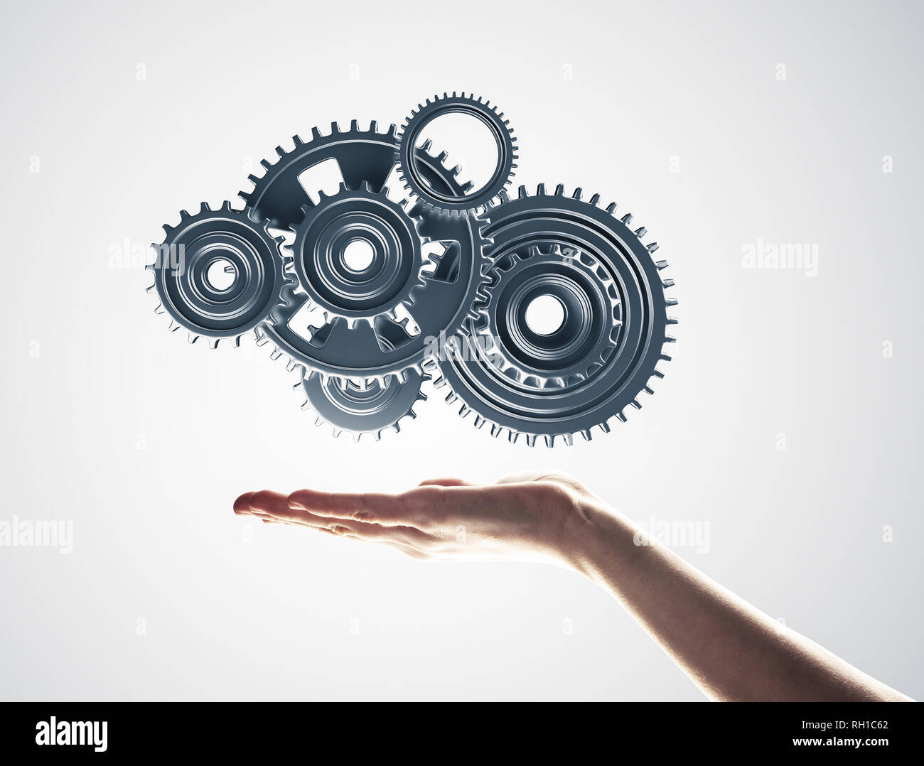 Concept of teamwork and cooperation presented with working gear engine ...