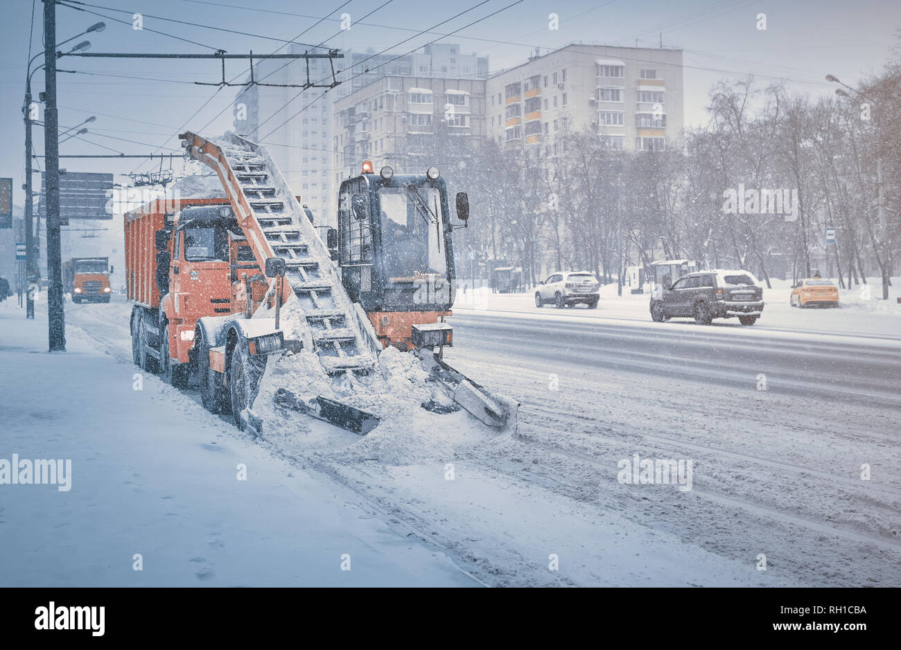 Moscow, Russia - Jan 2019: Snow removal tractor removes snow from the ...