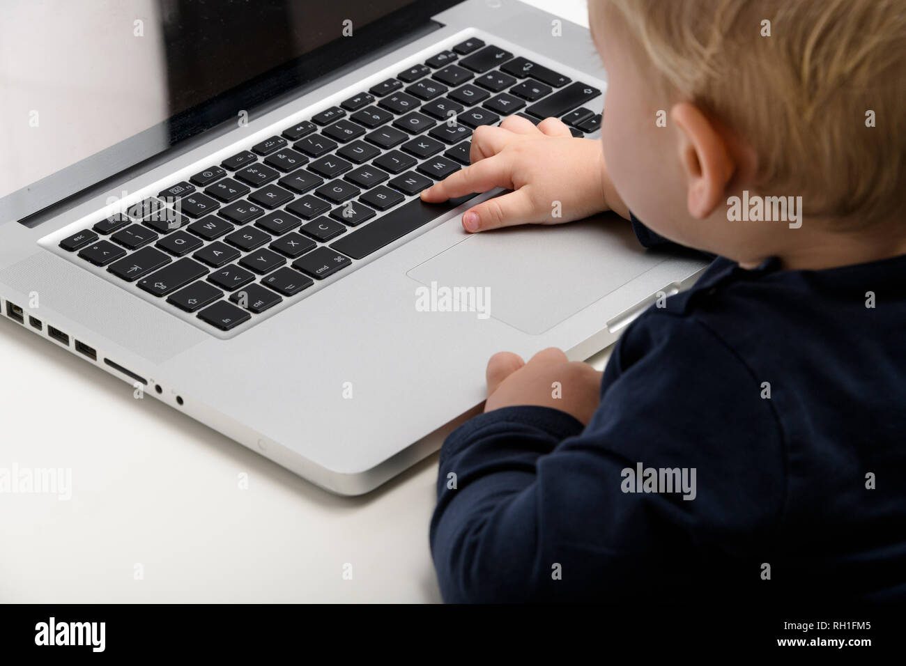 little boy working on computer Stock Photo - Alamy