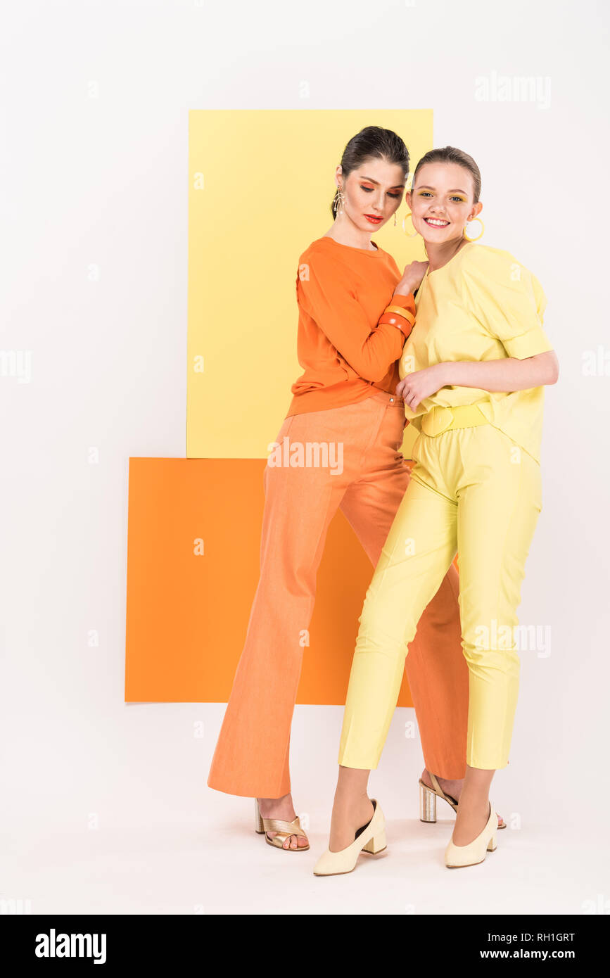 beautiful stylish girls posing with turmeric and limelight on ...