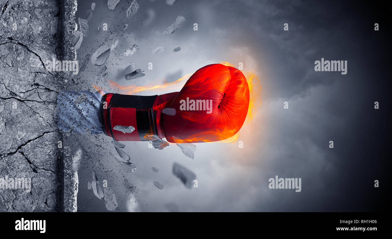 Big hand hits intense and breaks a crass stonewall Stock Photo - Alamy