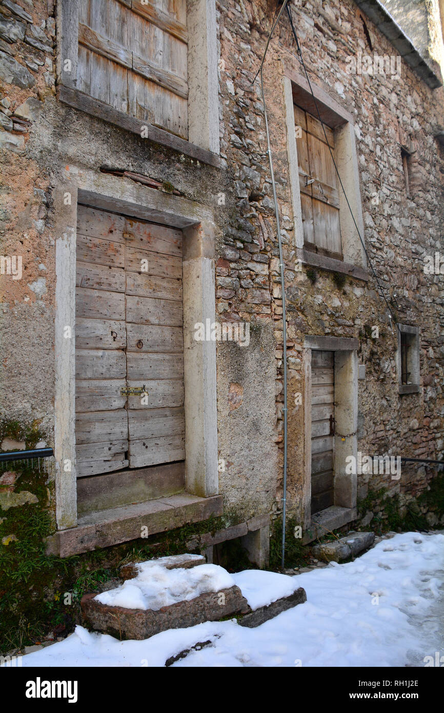 A street in the hill village of Casso in winter Friuli Venezia Giulia ...