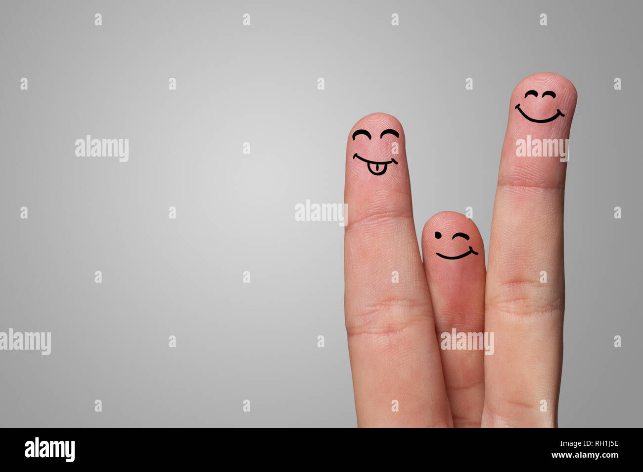 Happy face fingers hugs each other Stock Photo - Alamy