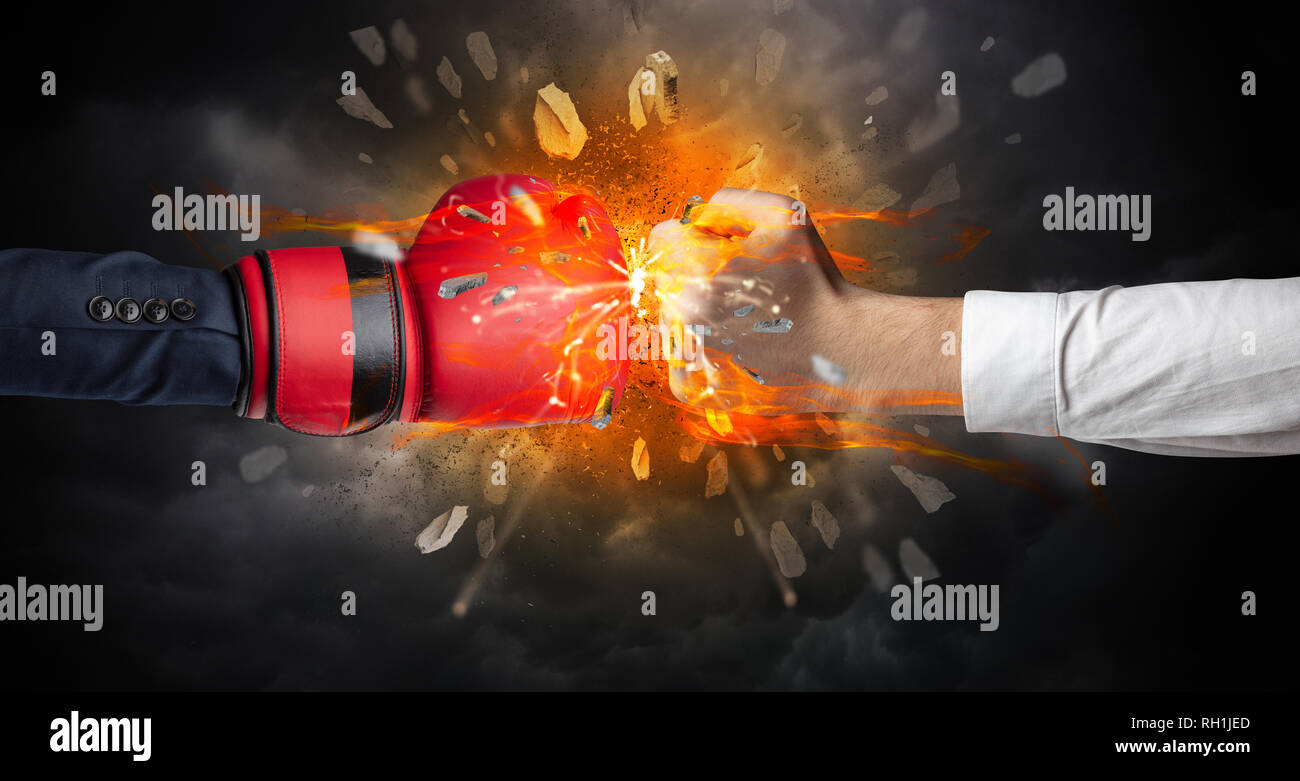 Two hands fighting and breaking a rock into small pieces Stock Photo ...