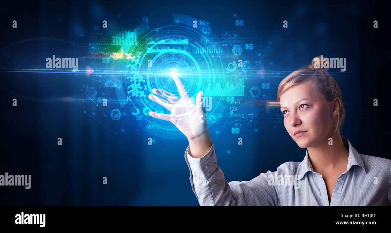 Woman touching hologram screen displaying medical symbols and charts ...