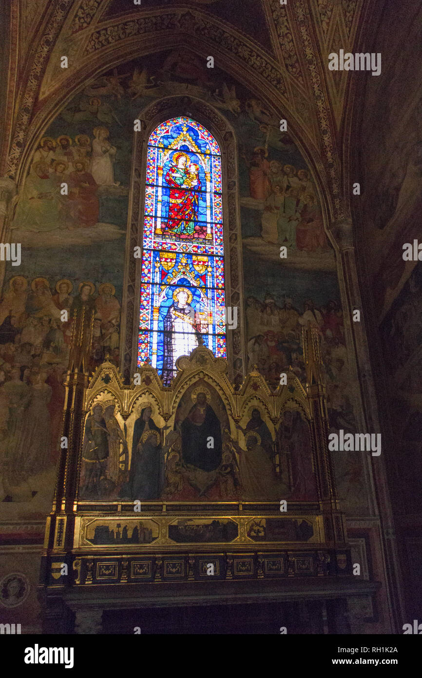 Italy, Florence - April 02 2017: the view of the glass window and altar ...