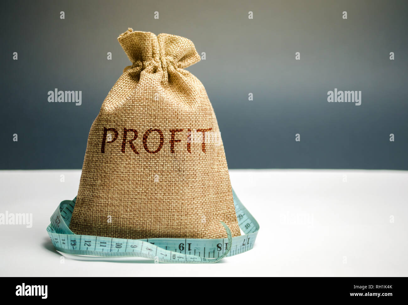 Money bag with the word Profit and tape measure. The concept of limited ...