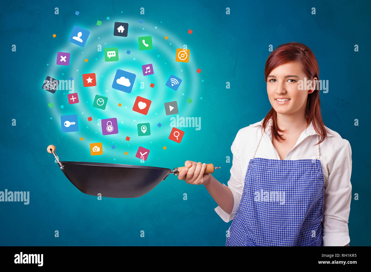 Young happy person cooking applications in wok Stock Photo - Alamy