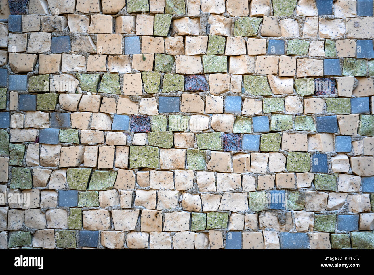 Close up colorful tile in stone wall texture Stock Photo - Alamy