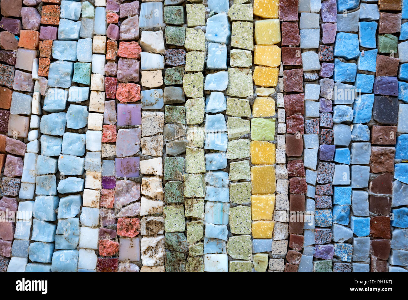 Close up colorful tile in stone wall texture Stock Photo - Alamy