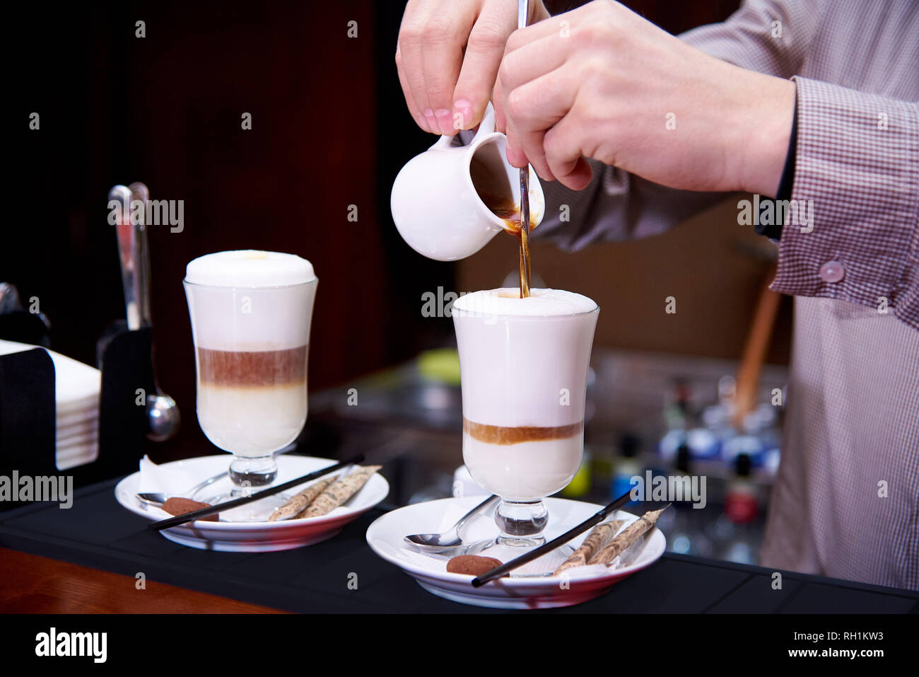 Bartender making coffee cocktail in bar Stock Photo - Alamy