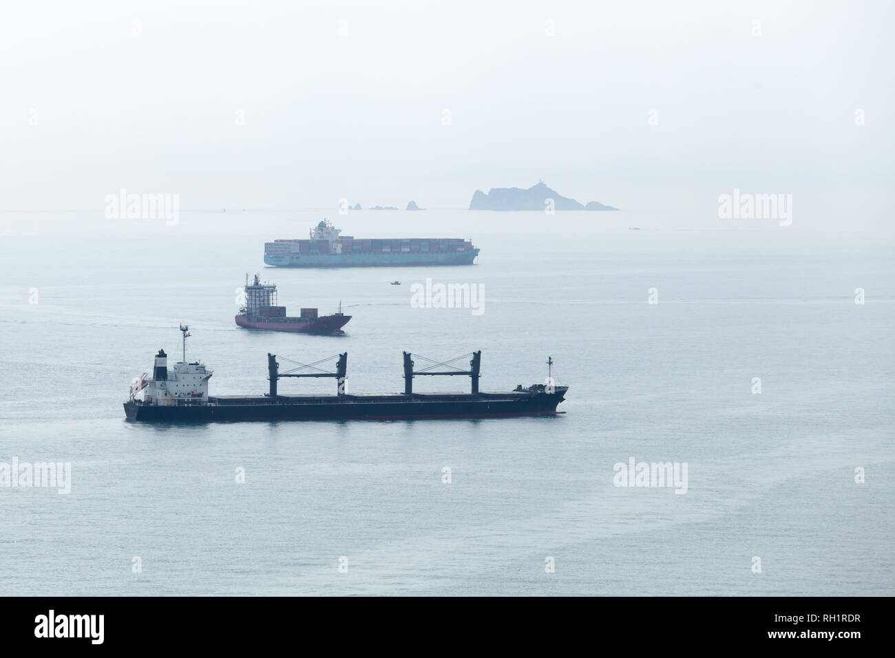 Industrial cargo ships are in Japan Sea, Busan bay, South Korea Stock ...