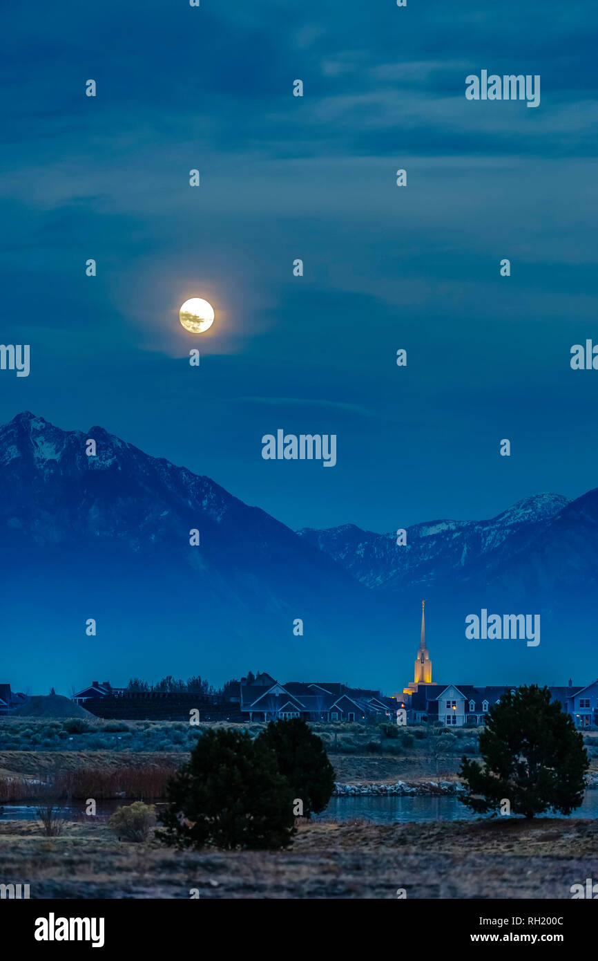 Lake homes mountain and full moon in Daybreak Utah Stock Photo - Alamy