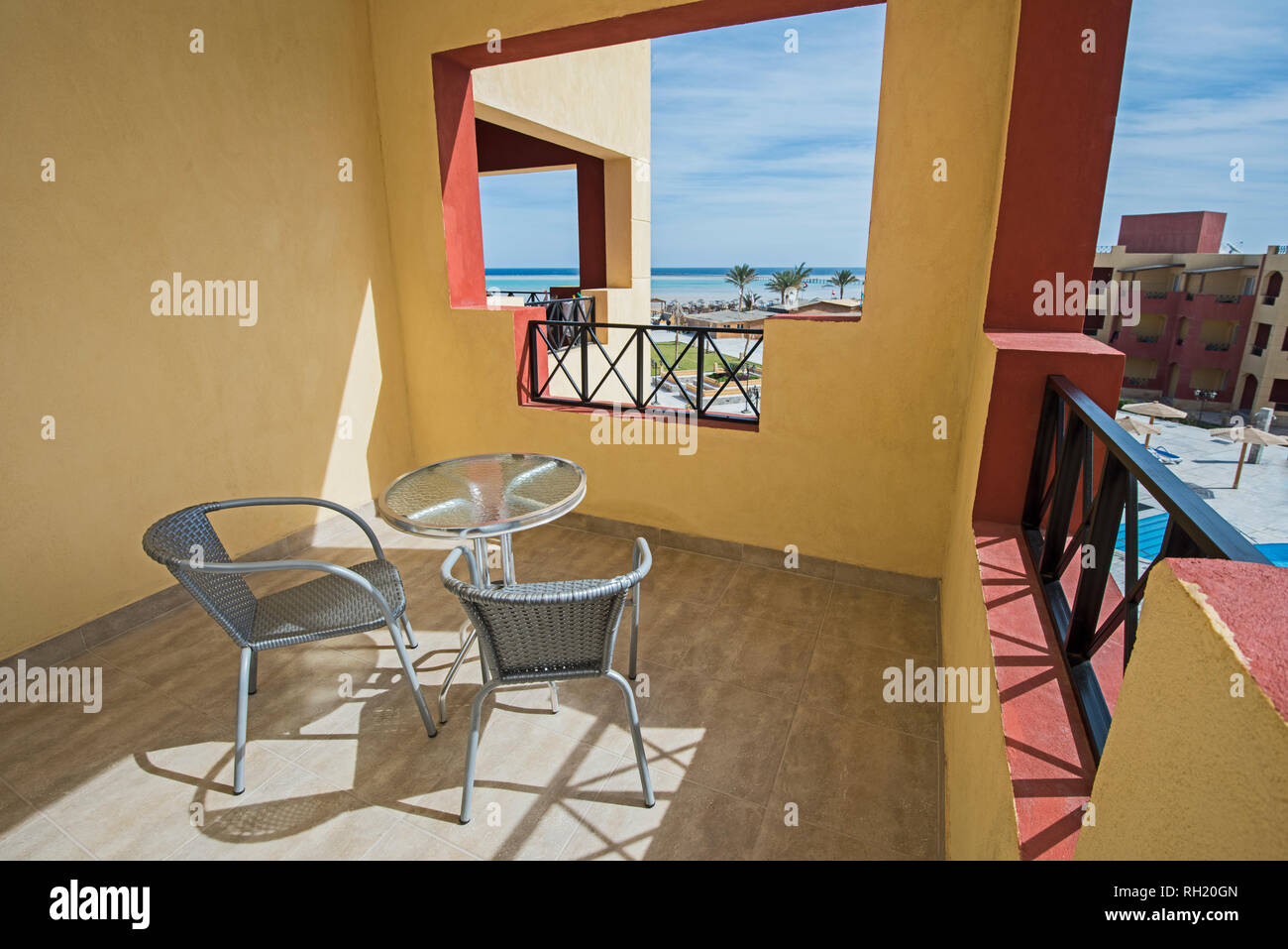 View from a balcony terrace of luxury hotel resort room with swimming ...