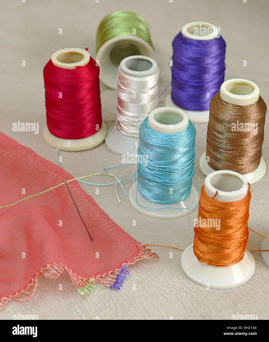 Colorful reels for handicrafts. colored sewing threads. colored sewing ...