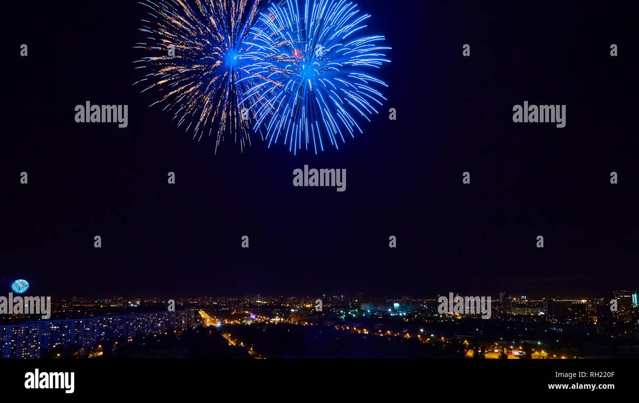 The firework over city at night Stock Photo - Alamy