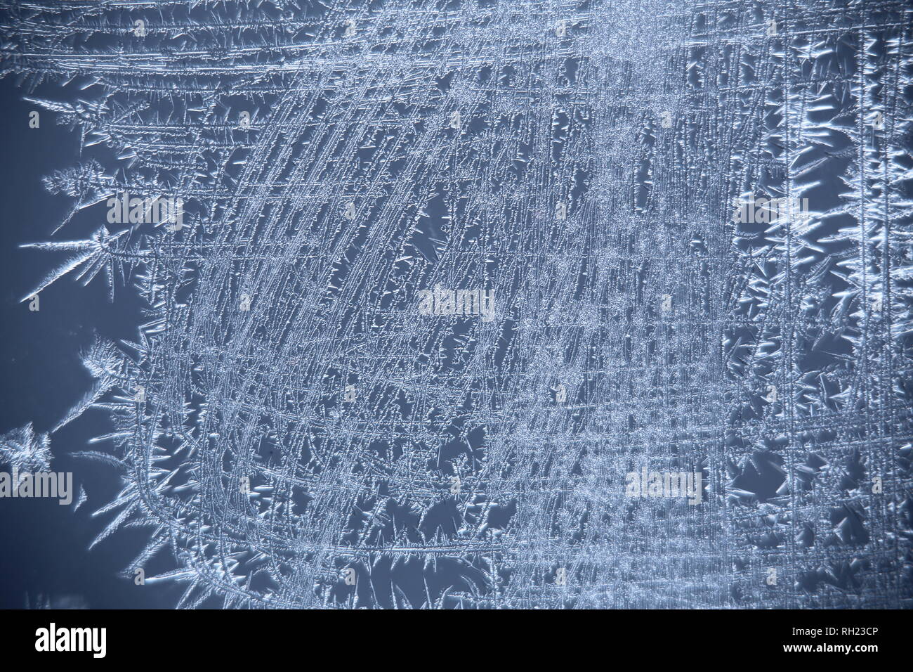 Abstract macro image of scratchy window frost Stock Photo - Alamy