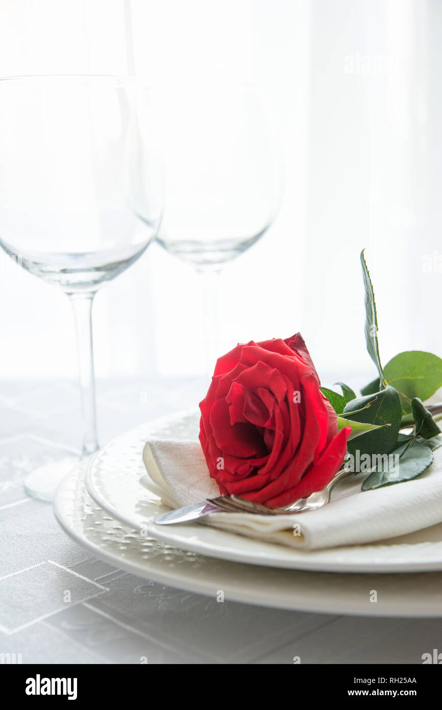 Valentine's day or romantic dinner with red rose Stock Photo - Alamy