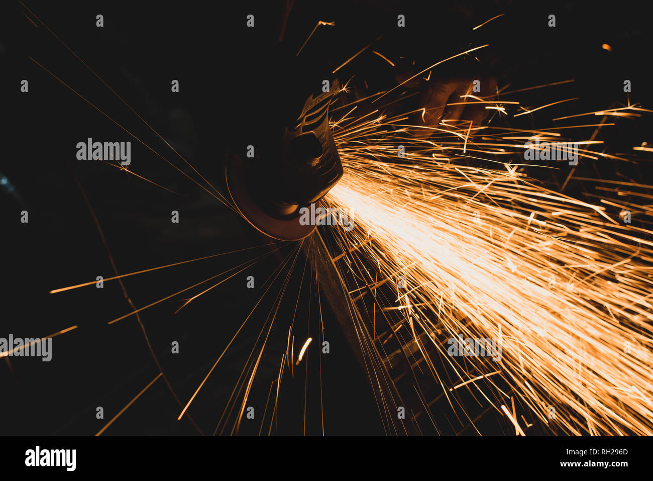 Welder grinder metal with electric grinder Stock Photo - Alamy