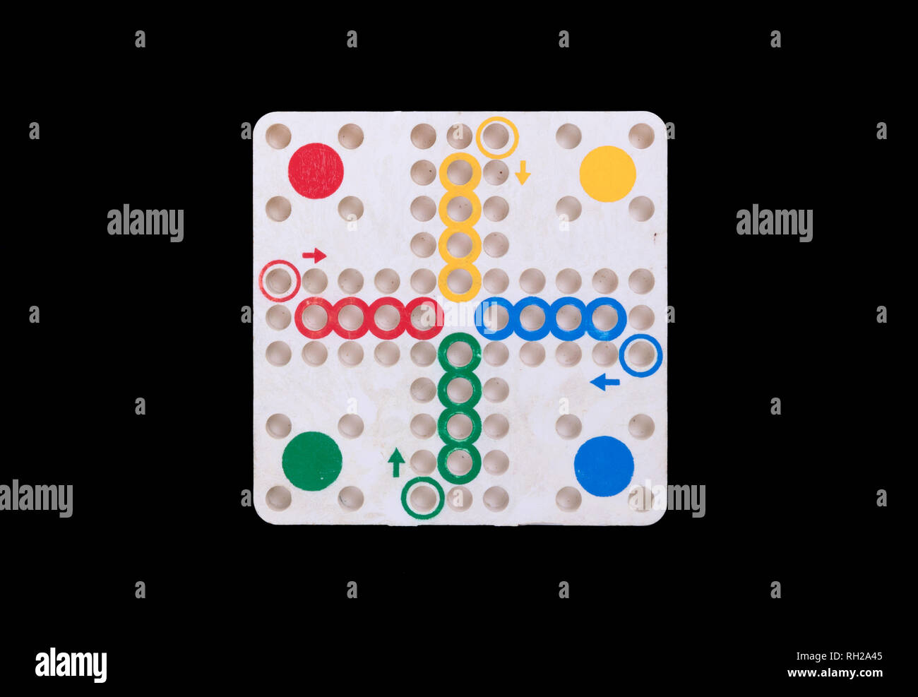 Vintage game of ludo, isolated on black background Stock Photo - Alamy