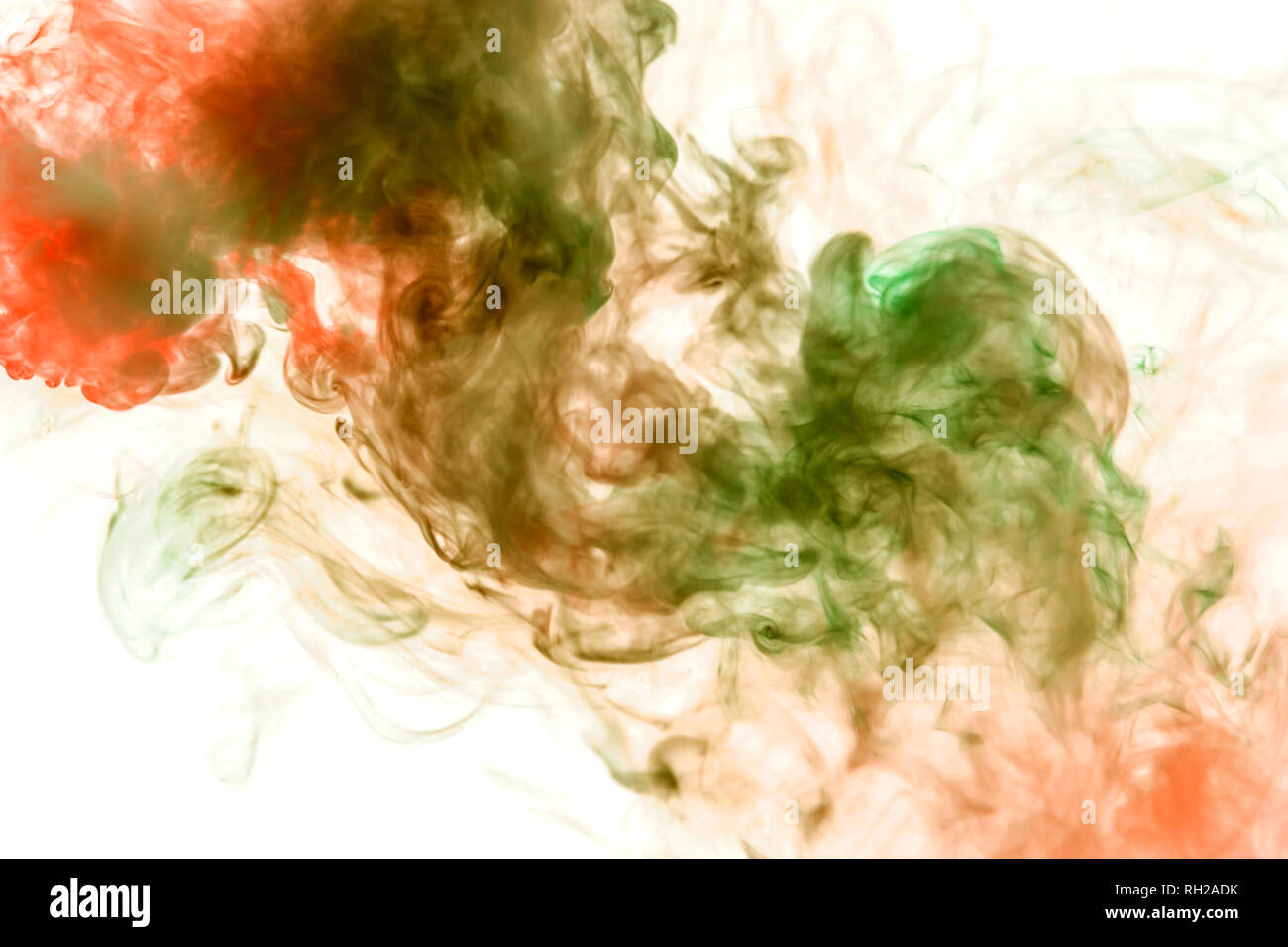 Translucent, thick smoke, illuminated by light against a white ...