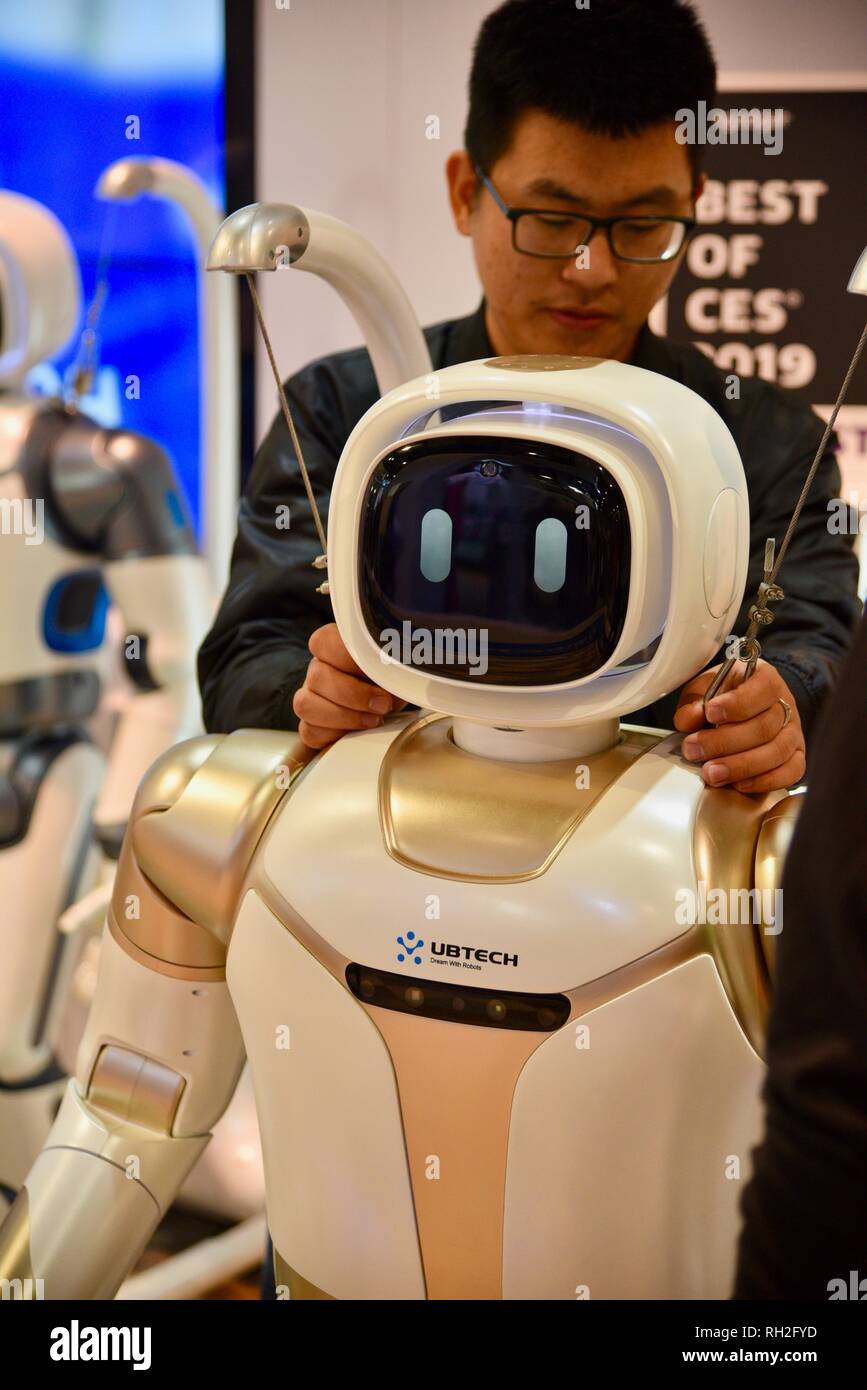 Ubtech's humanoid robot, Walker, demonstrates robotic skills at exhibit ...